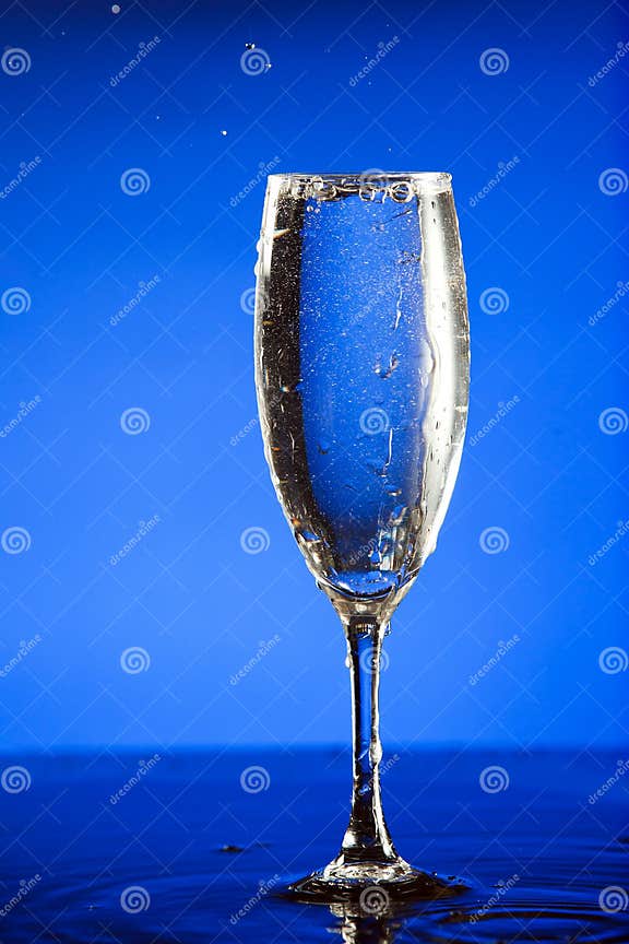 Overflowing glass of wine stock photo. Image of wine - 25544296