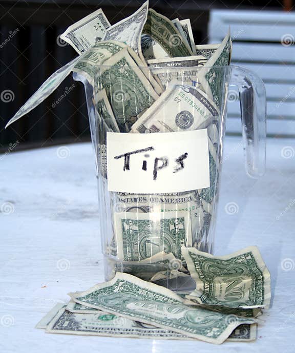 Overflowing tip cup stock photo. Image of cash, finance - 1335056
