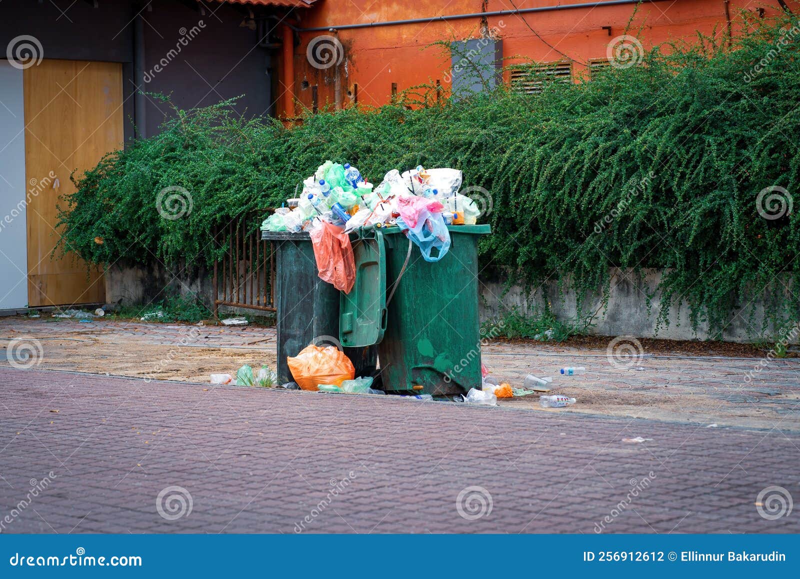 An Overflowing Trash Can or Garbage Can with Various Plastic Containers ...