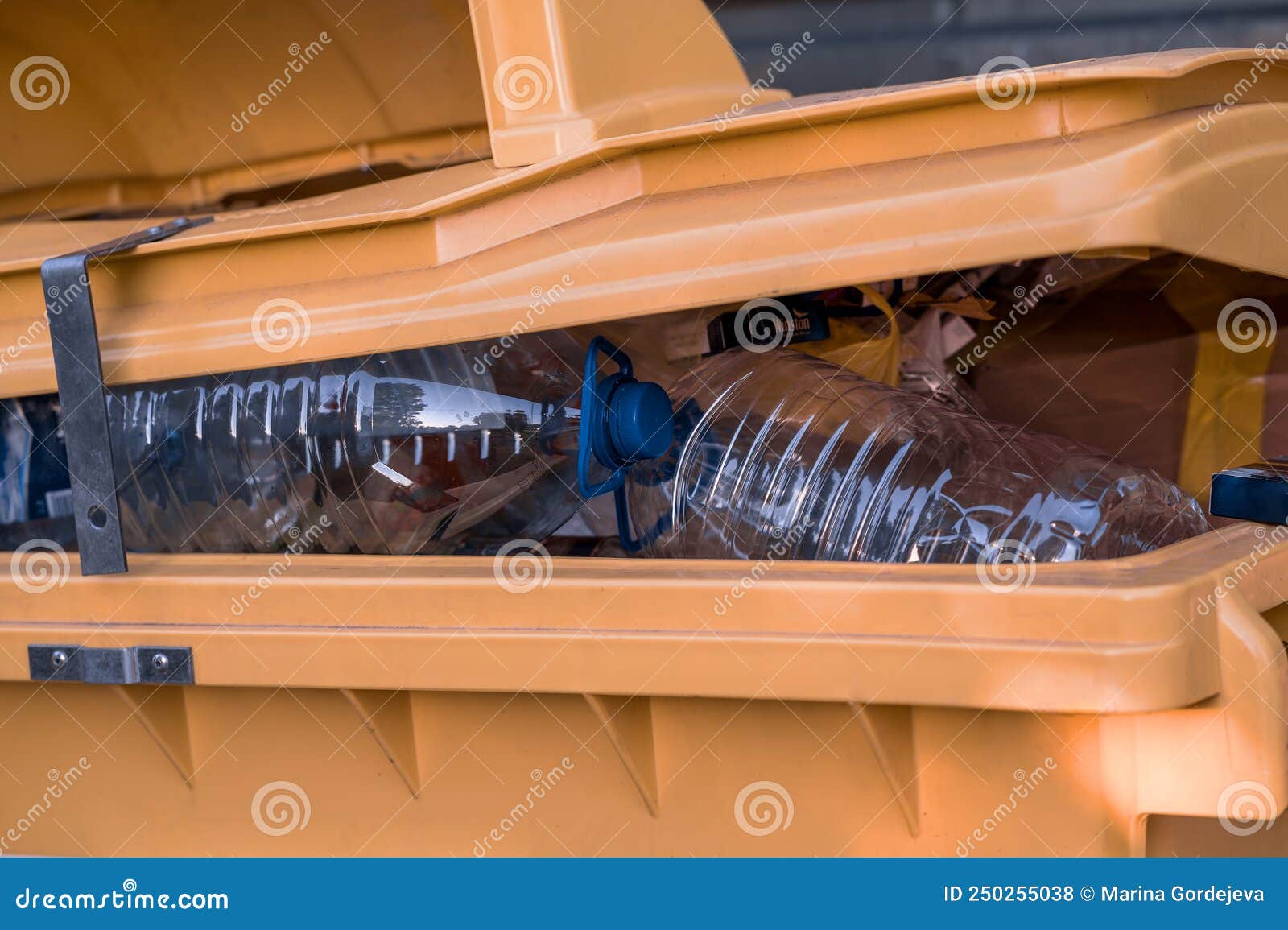 Overflowing Yellow Container for Plastic Waste. Waste Sorting Stock ...