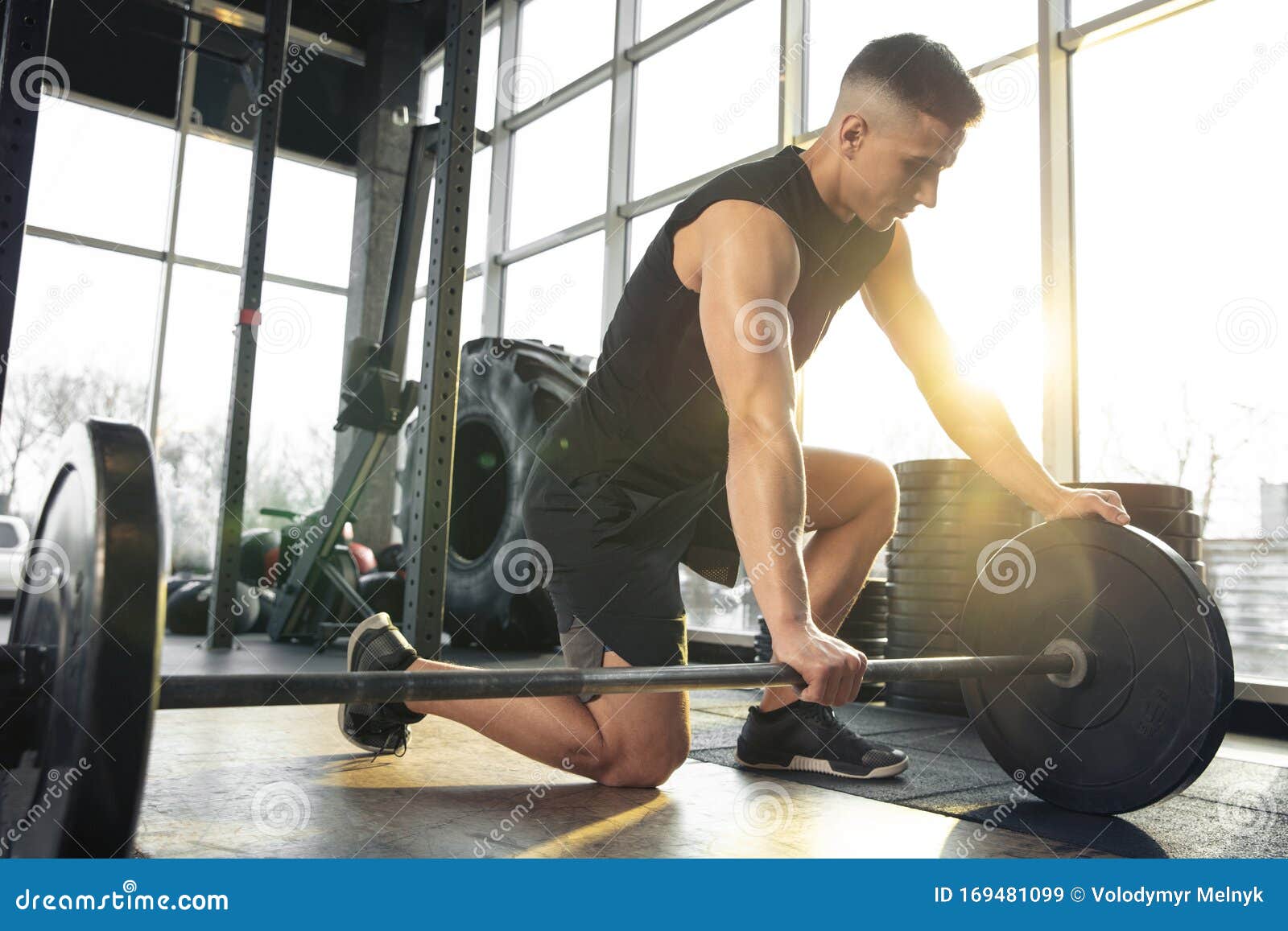 The Male Athlete Training Hard in the Gym. Fitness and Healthy Life ...