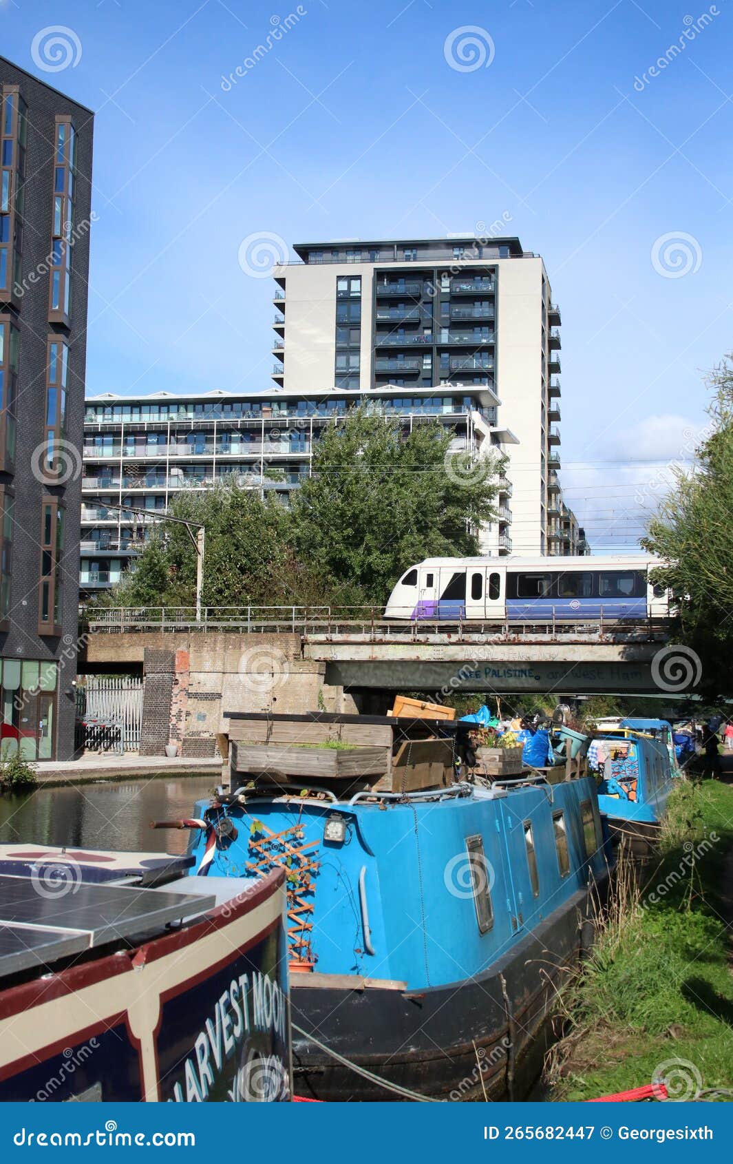 Overground Train and Canal Boats, Tower Hamlets Editorial Photography ...