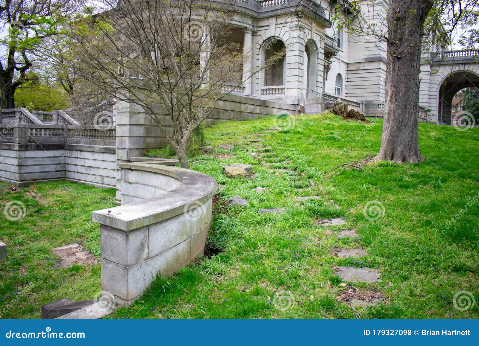 An Overgrown Stone Path Leading Up To a Mansion Stock Photo - Image of ...