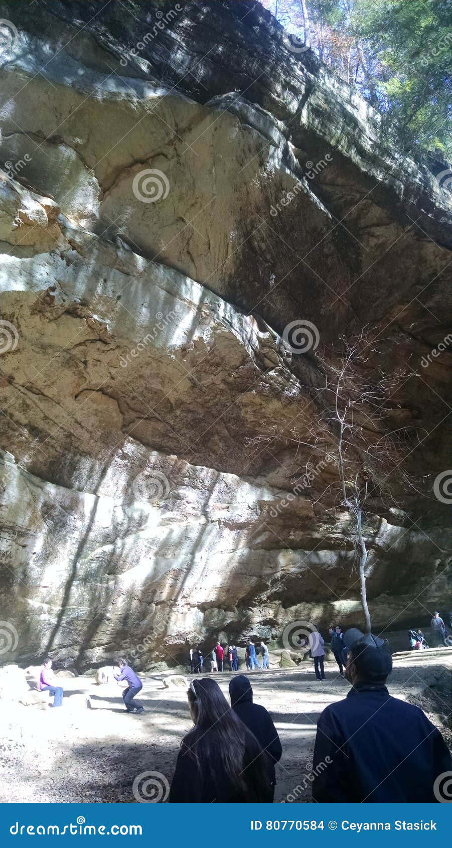 Overhanging cliff editorial stock image. Image of people - 80770584