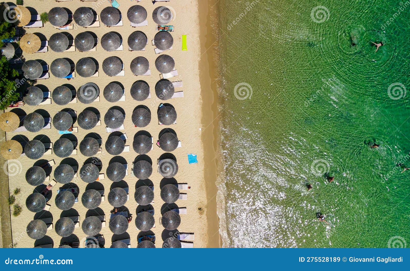 Overhead Aerial View of Beach Umbrellas Along a Beautiful Beach Stock ...