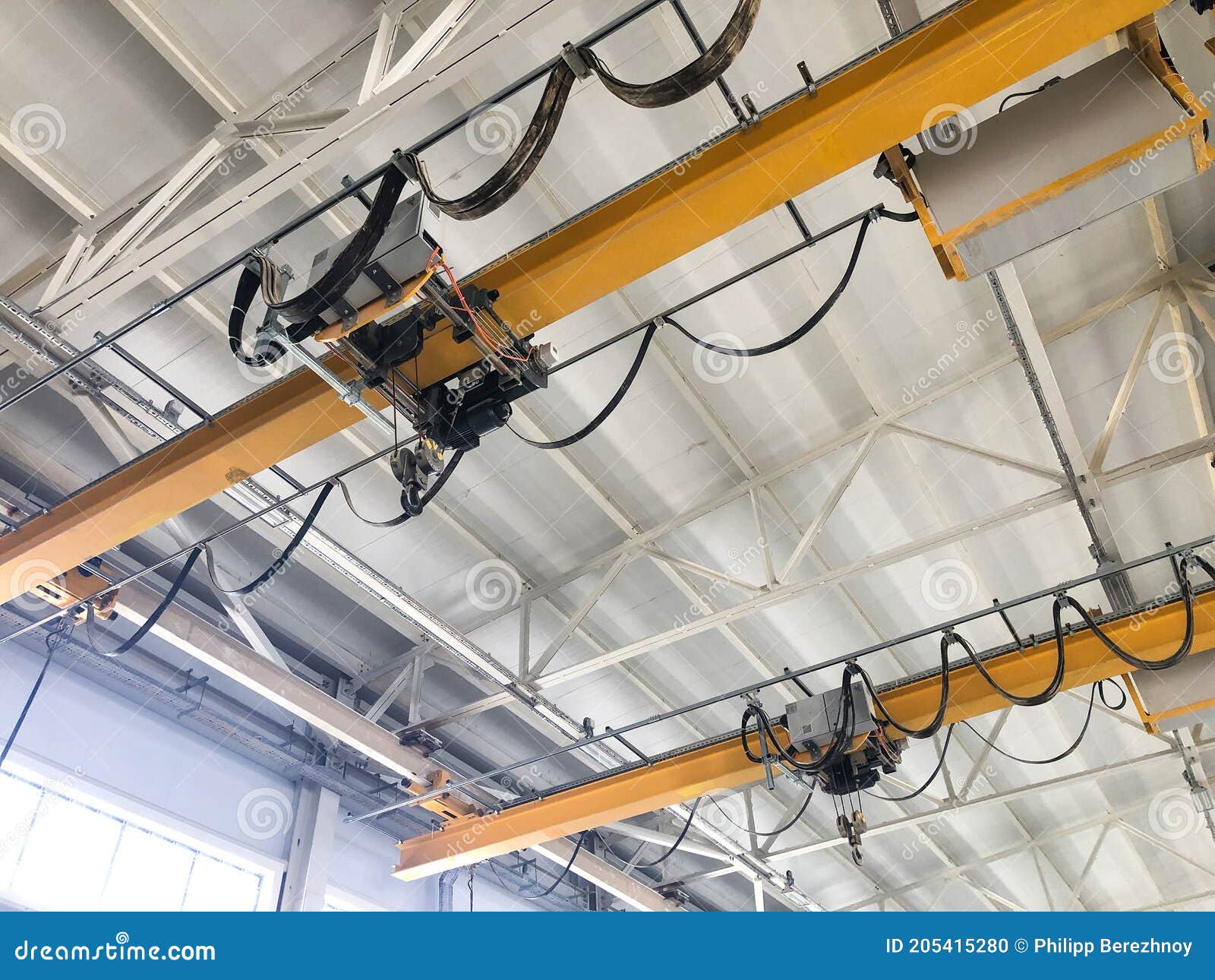 Overhead Cranes Inside Industrial Building. Bridge Cranes Inside Hangar ...