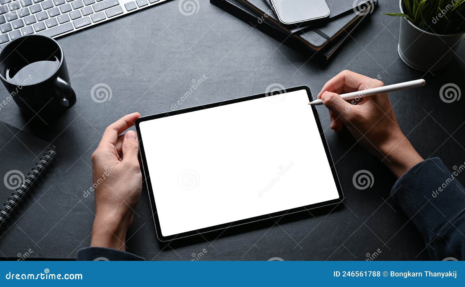 A Man Using Stylus Pen and Working on Digital Tablet at His Workspace ...