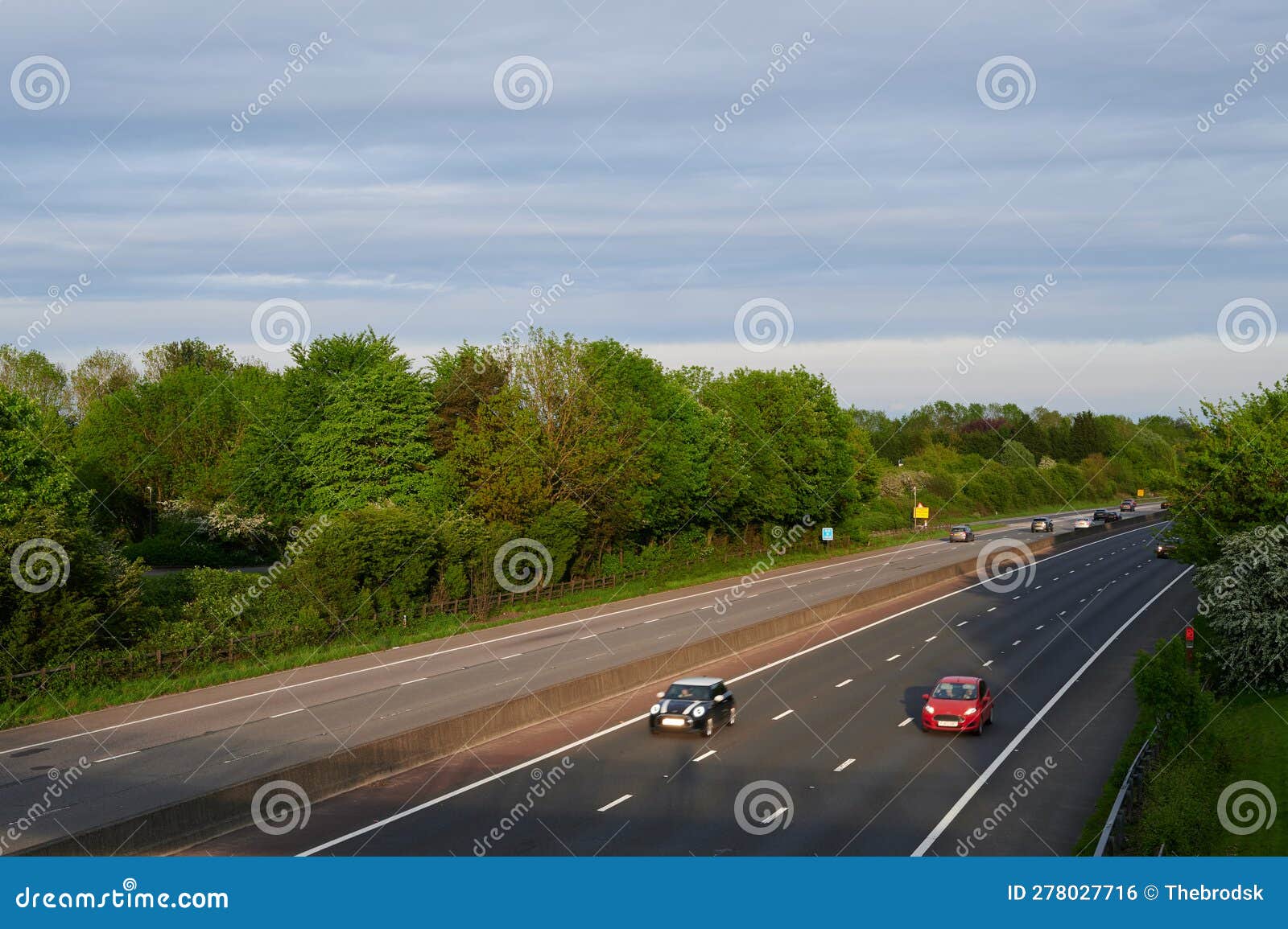 Overhead Image of Three Lane Motorway in Daylight with Motion Blur of ...