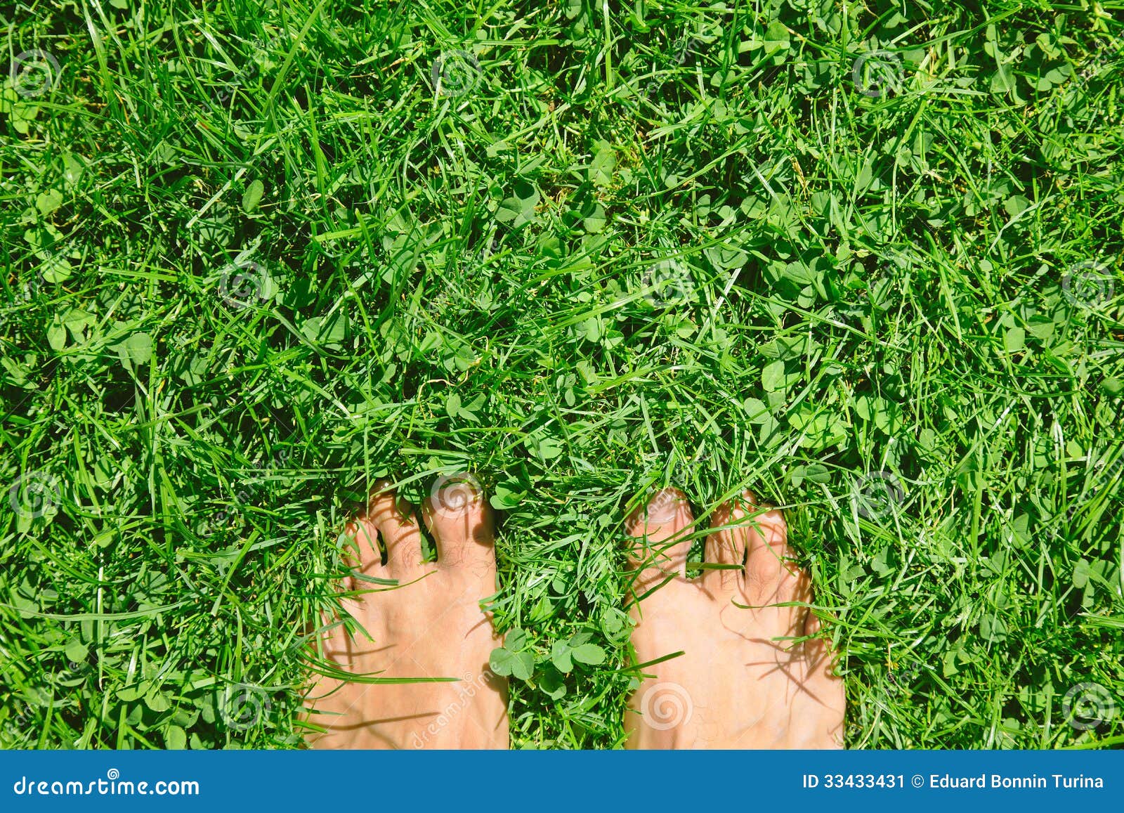 Overhead Photo of Feets on Grass Background. Stock Image - Image of ...