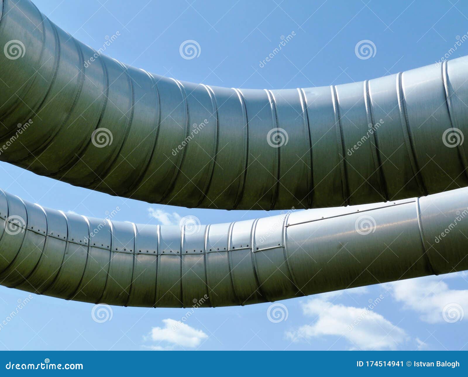 Overhead Overhead Pipeline with Expansion Loop and Blue Sky Stock Image ...