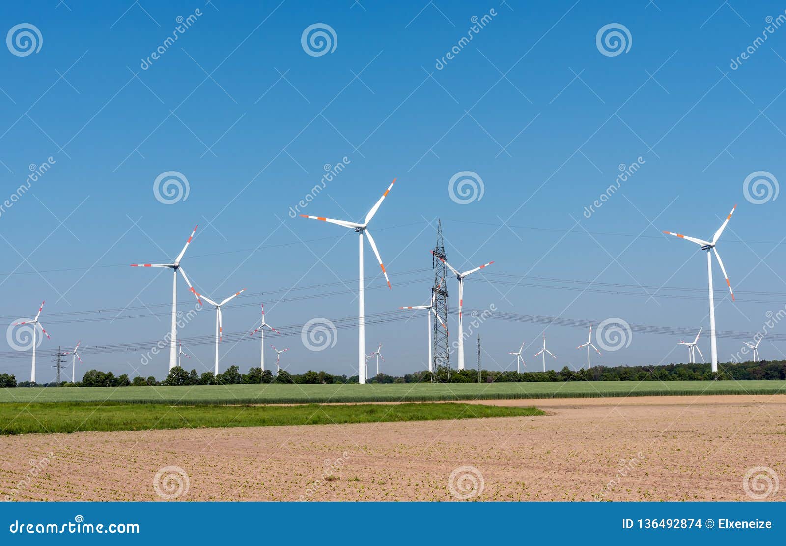 Overhead Power Lines and Modern Wind Turbines Stock Photo - Image of ...