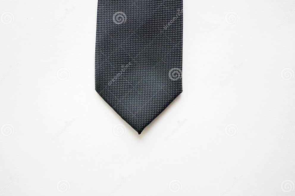Overhead Shot of a Black Tie on a White Surface Stock Photo - Image of ...