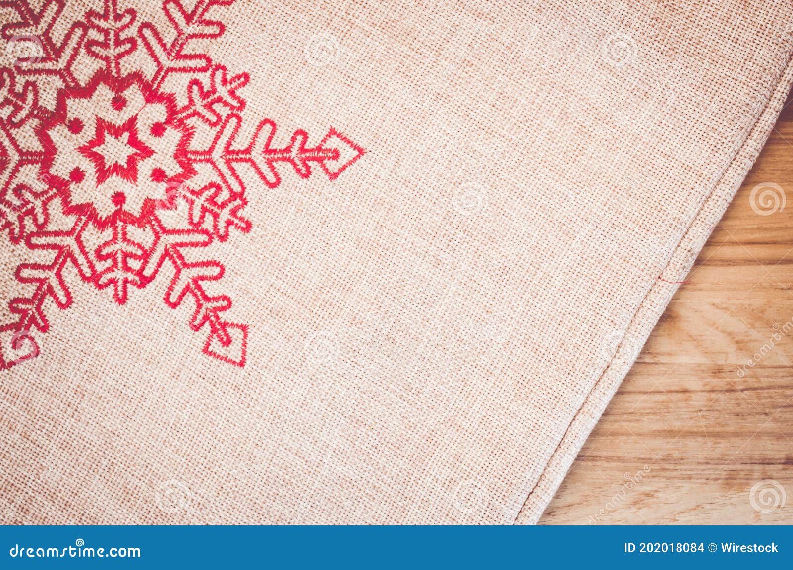 Overhead Shot of a Burlap Cloth Decorated with a Sewed Red Snowflake ...