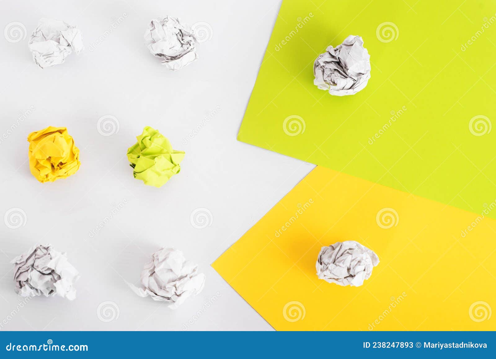 Overhead Shot of Crumpled Paper in Oder and Colored Flat Sheets of ...