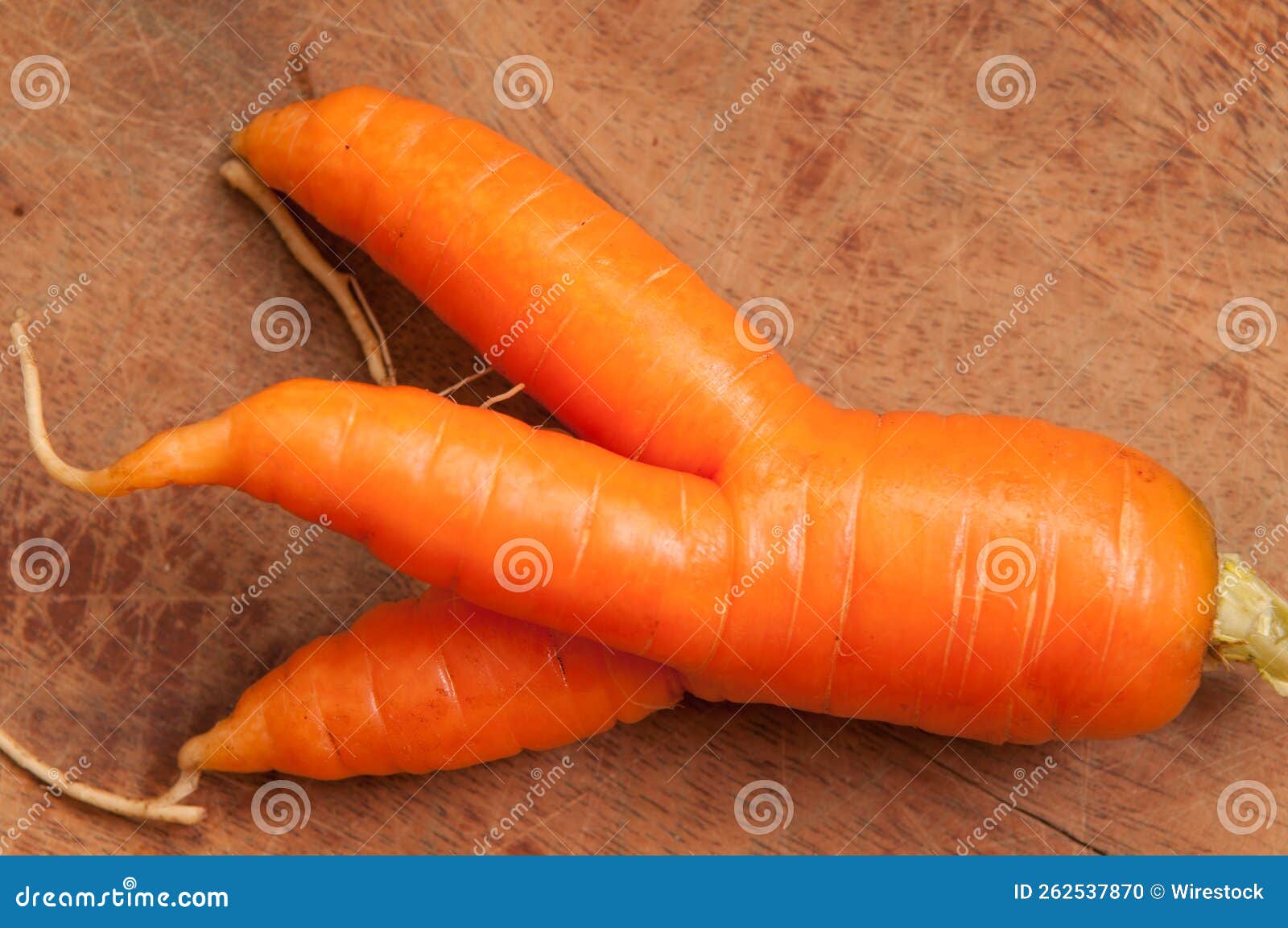 Overhead Shot of Farm-fresh Carrots Bent and Twisted Stock Photo ...