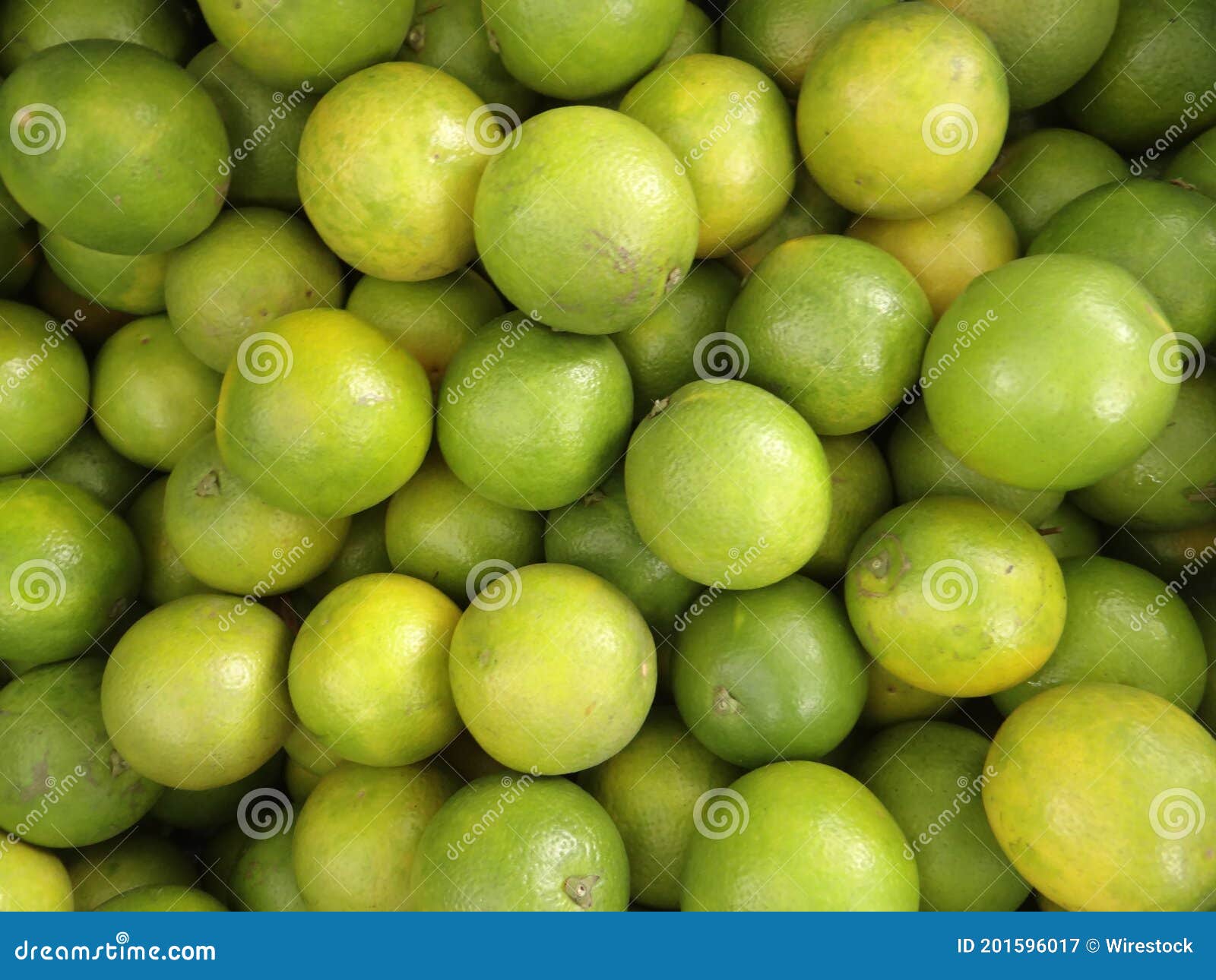 Overhead Shot of Fresh Limes in a Bunch in the Market Stock Image ...
