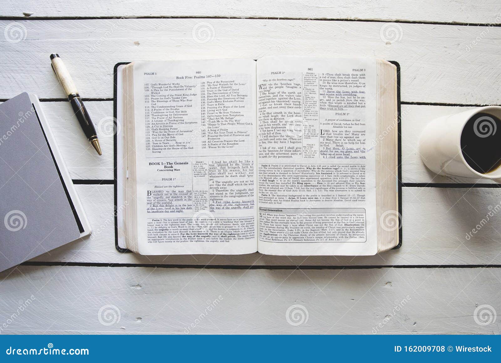 Overhead Shot of an Open Bible in between a Coffee and a Notepad with a ...