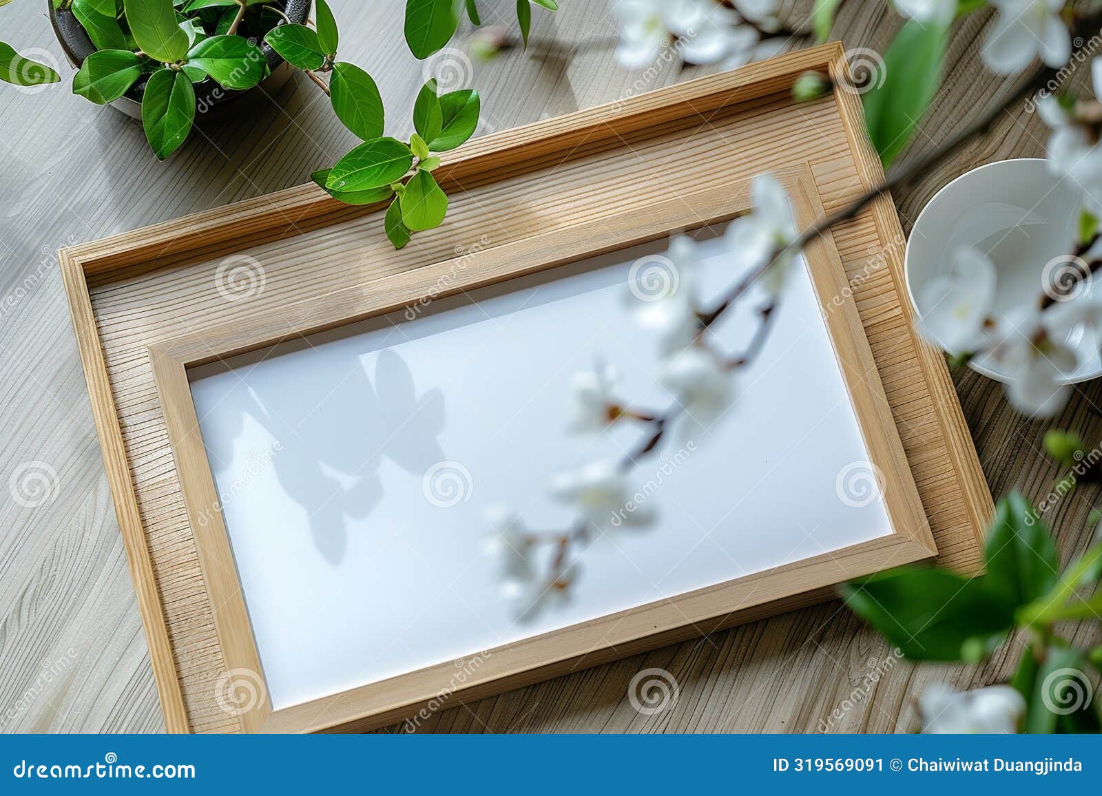 Overhead Shot of a Plain White Print in a Modern Wooden Frame Lay Flat ...