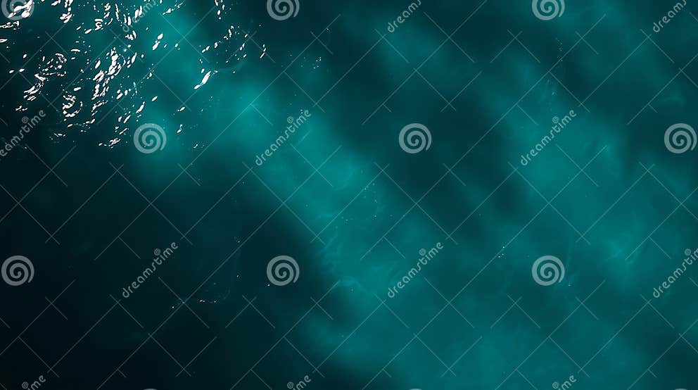 An Overhead Shot Reveals the Deep Teal Ocean Water, Sunlight Filtering ...