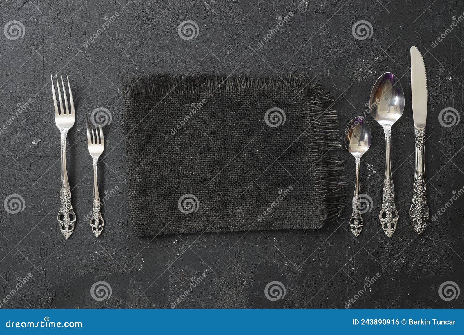Overhead Shot of Silverware on Black Table with Copy Space. Stock Photo ...