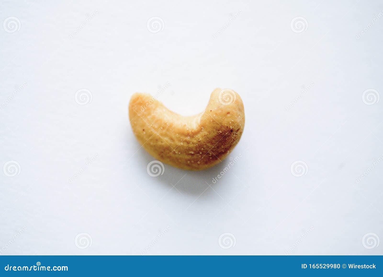 Overhead Shot of Single Cashew on a White Surface Stock Photo - Image ...