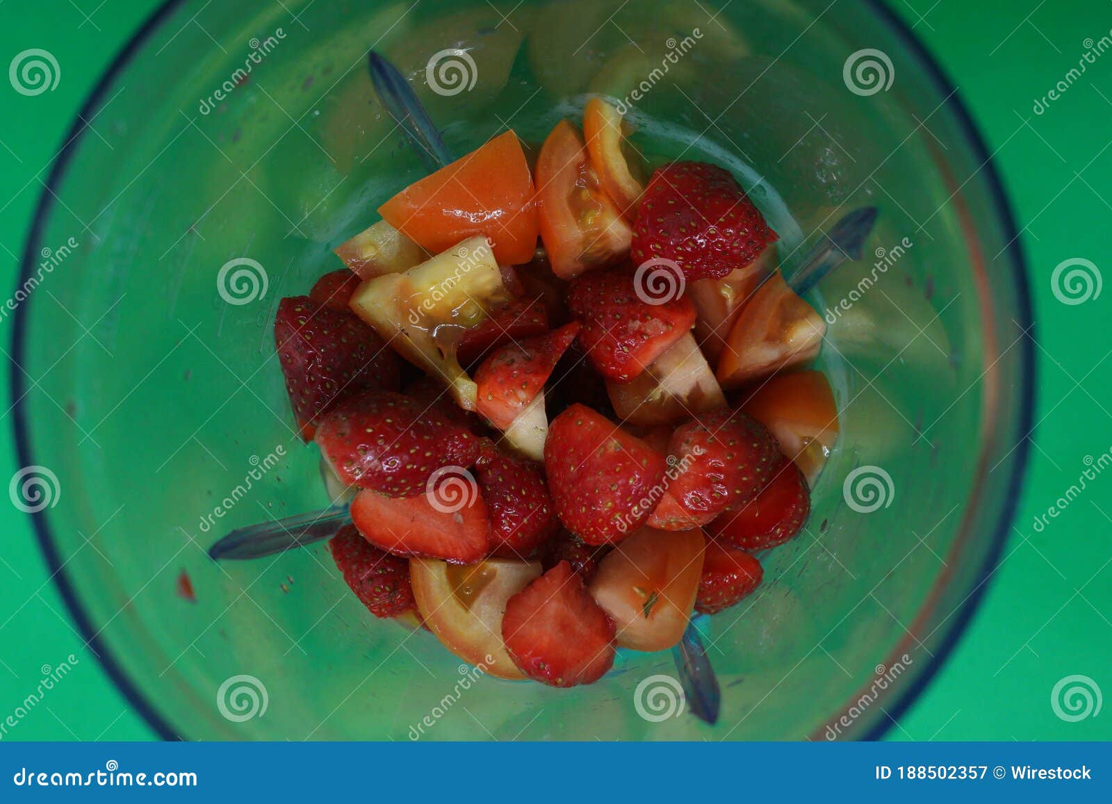 Overhead Shot of Sliced Strawberries and Tomato in a Blender Stock ...