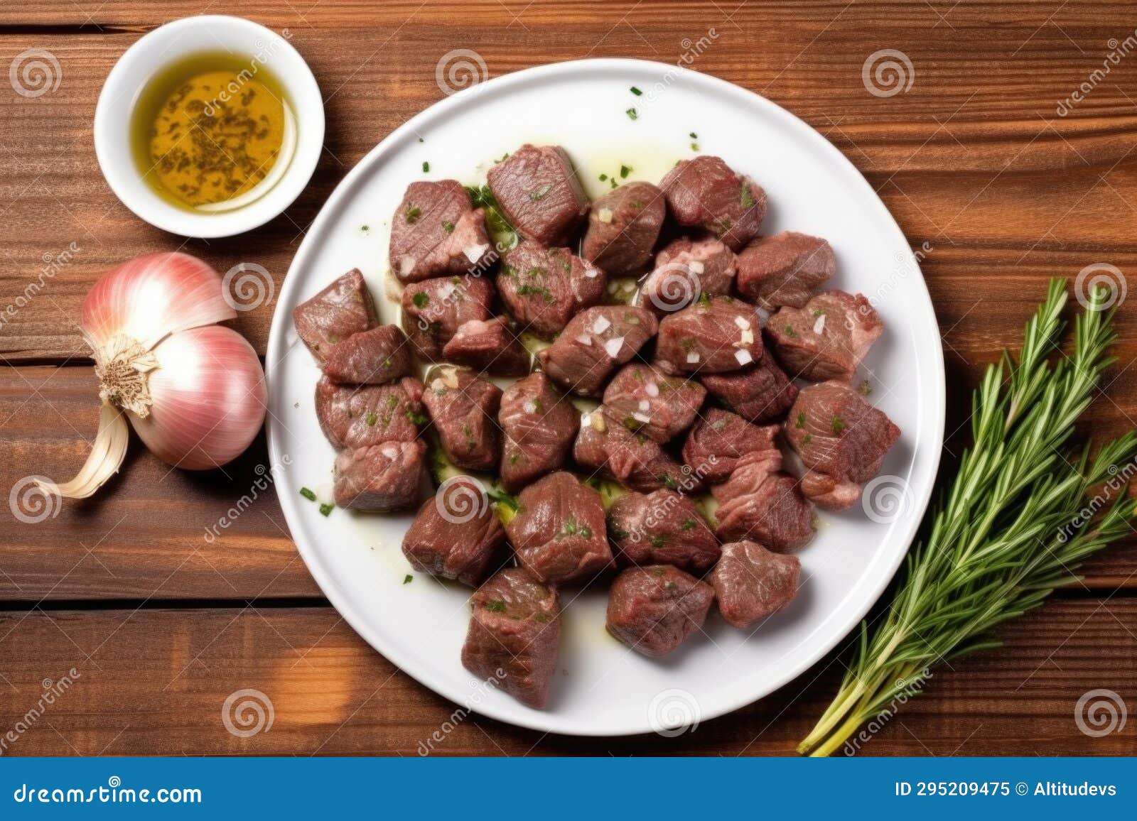 Overhead Shot of Steak Tips Marinated with Garlic on Plate Stock Image ...