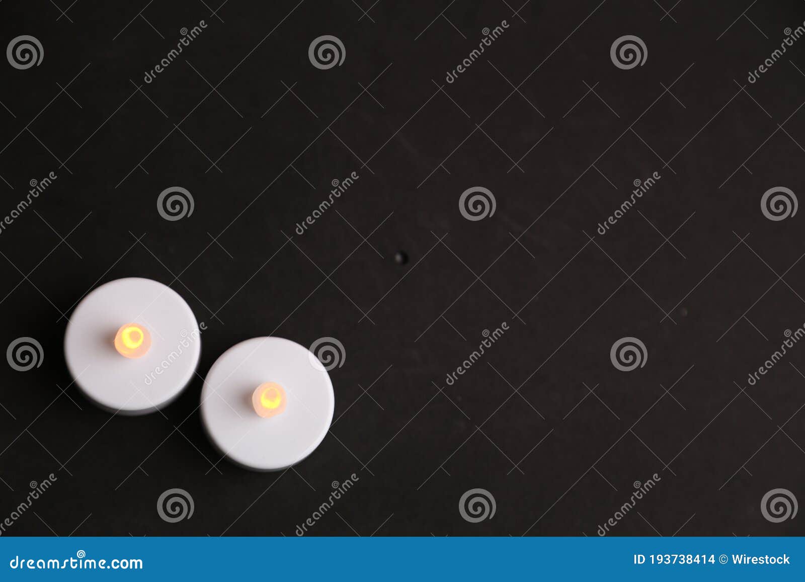 Overhead Shot of White Plastic Led Candles on a Black Surface Stock ...