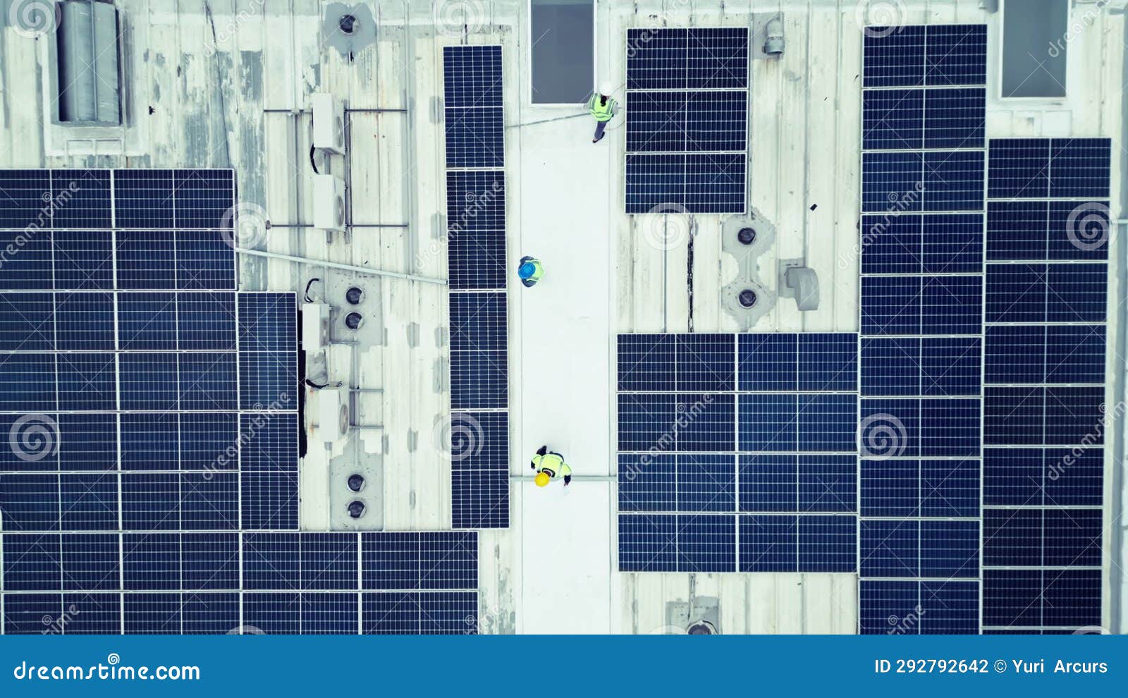 Overhead, Solar and Construction Worker Team on the Roof of a Building ...