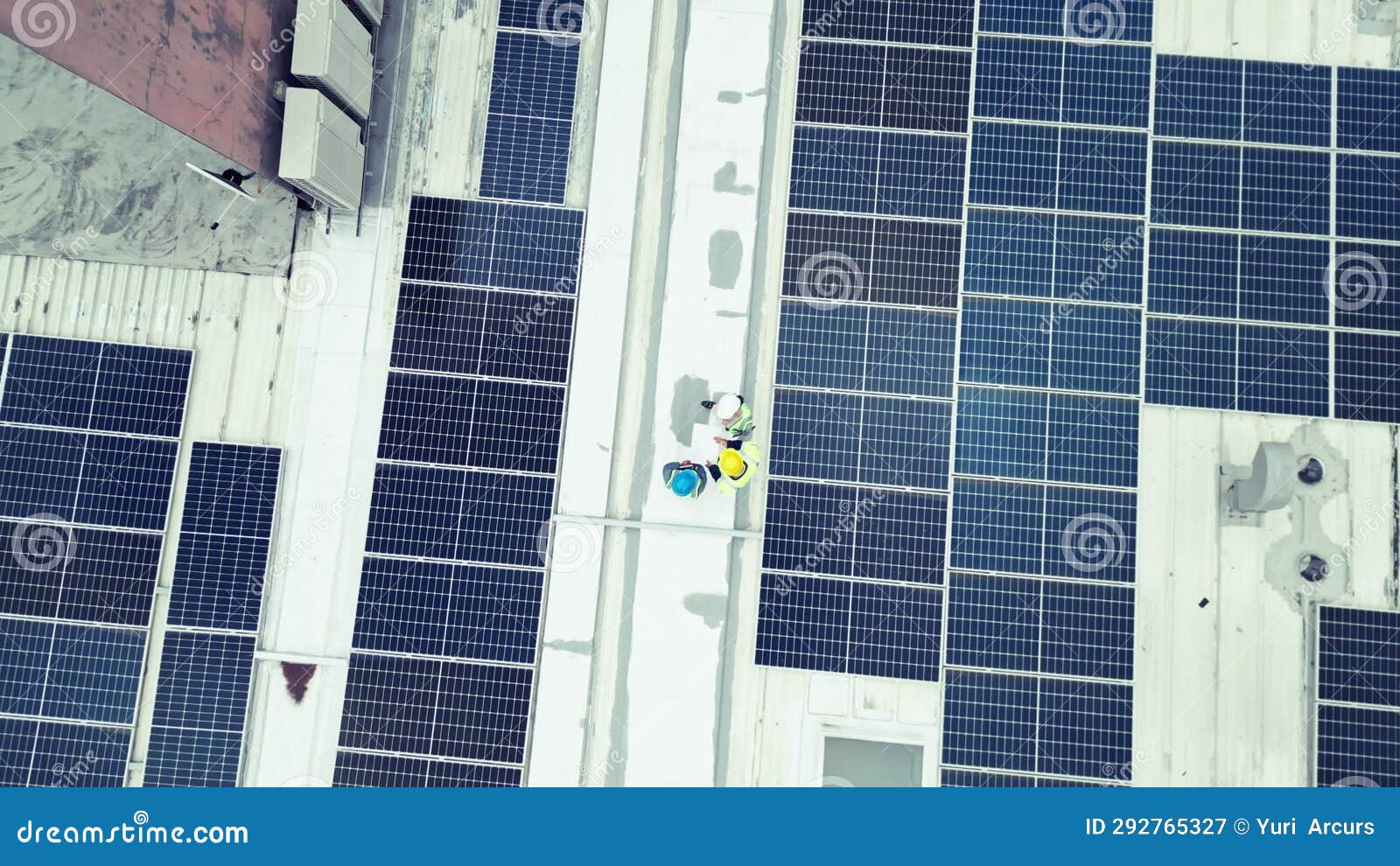 Overhead, Solar Energy and a Construction Team on the Roof of a ...