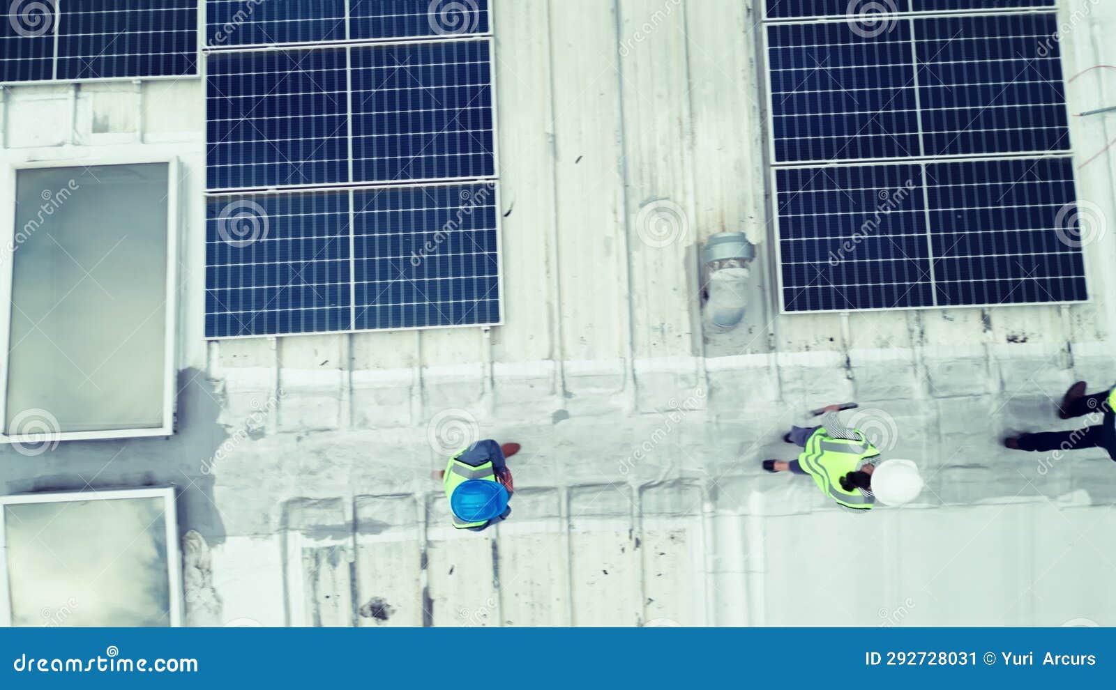 Overhead, Solar Energy and Construction Teamwork on the Roof of a ...