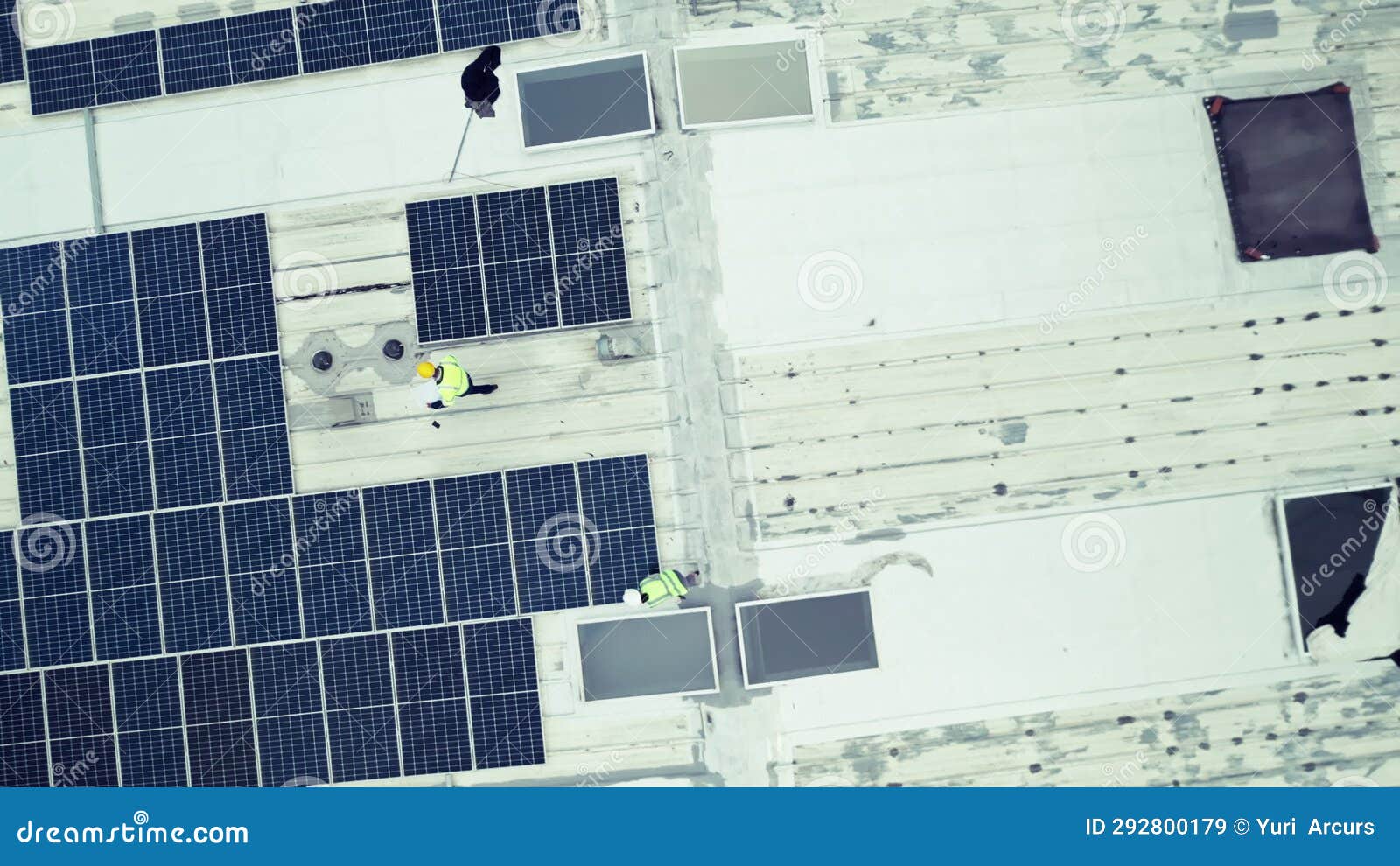 Overhead, Solar Power and a Construction Worker Team on the Roof of a ...