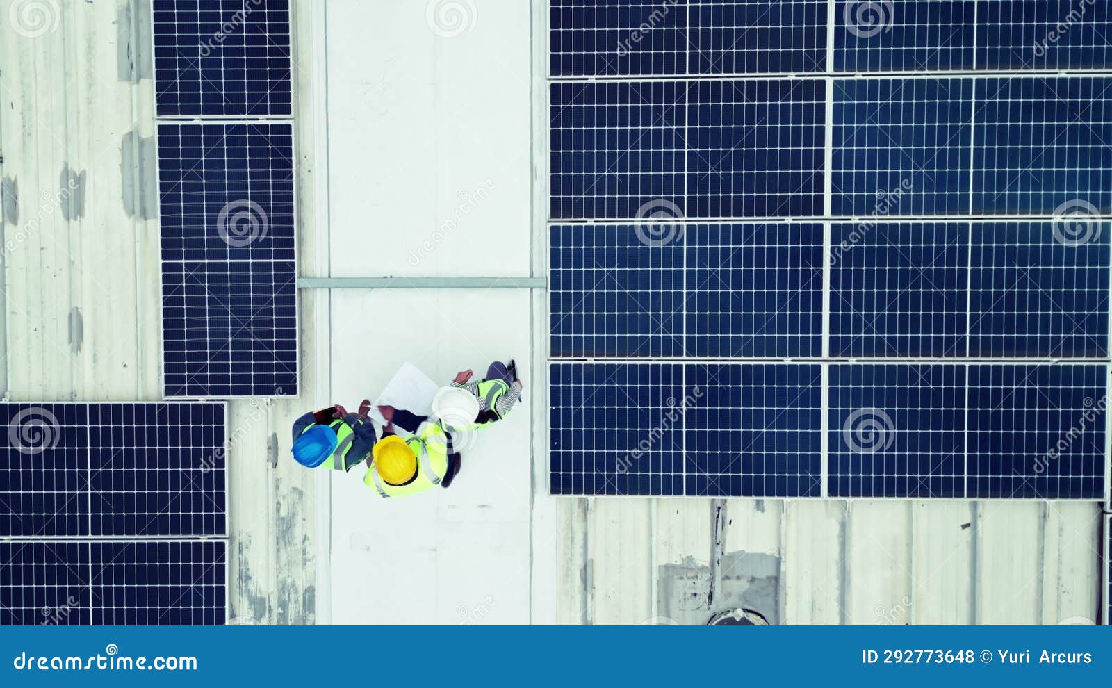 Overhead, Solar Power and an Engineering Team on the Roof of a Building ...