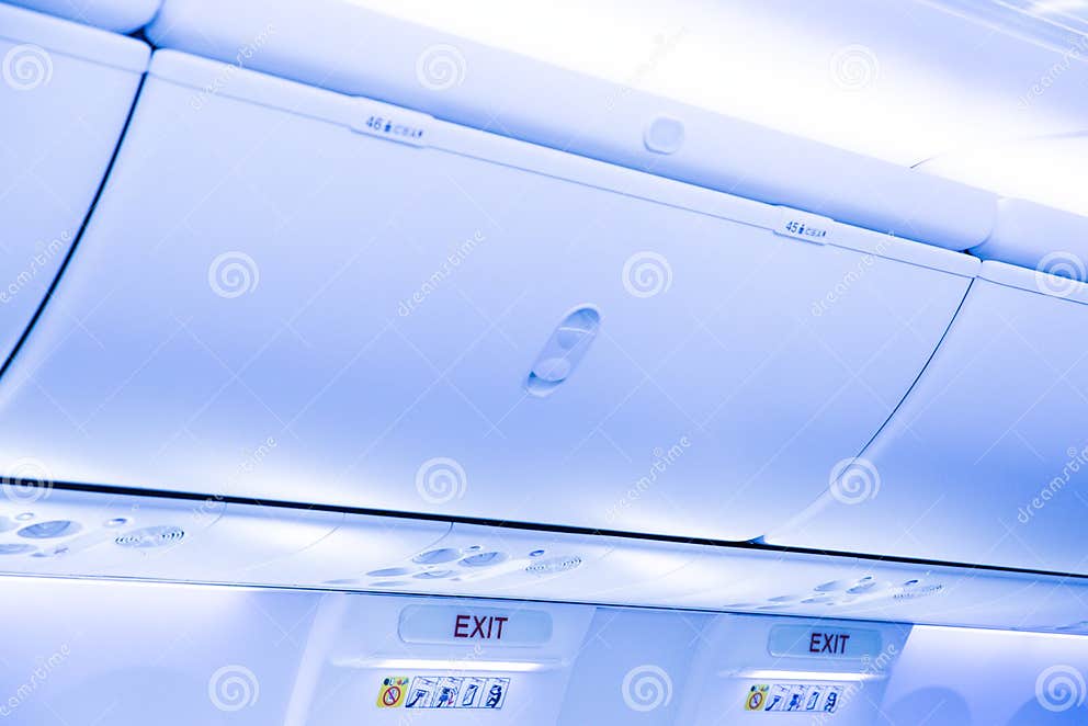 Overhead Stowage or Overhead Bin and Emergency Exit Door Stock Photo ...