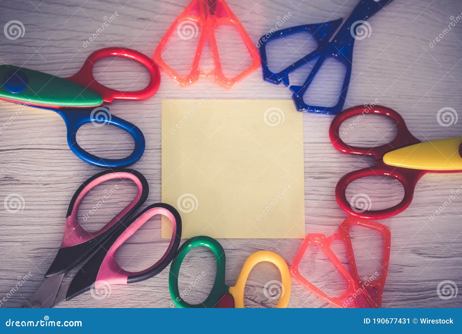 Overhead Top View of Colorful Scissors and a Note Paper on a Wooden ...
