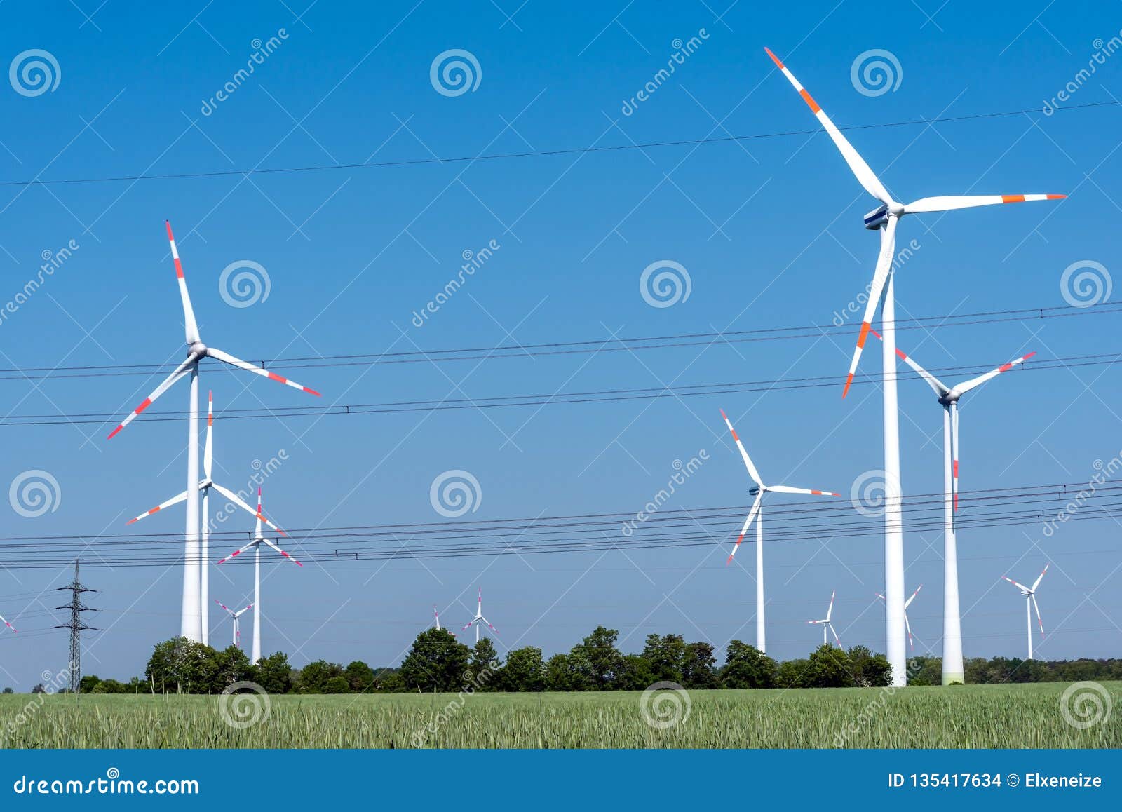 Overhead Transmission Lines and Wind Turbines Stock Photo - Image of ...