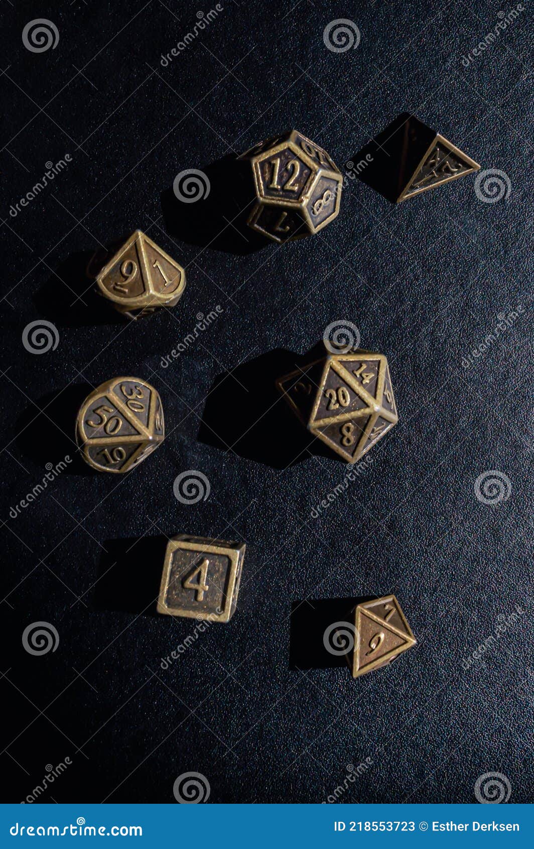 Overhead Vertical Image of a Bronze Colored Set of Role-playing Game ...
