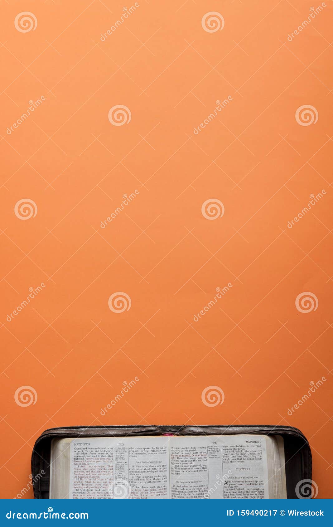 Overhead Vertical Shot of an Open Book on an Orange Surface Stock Image ...