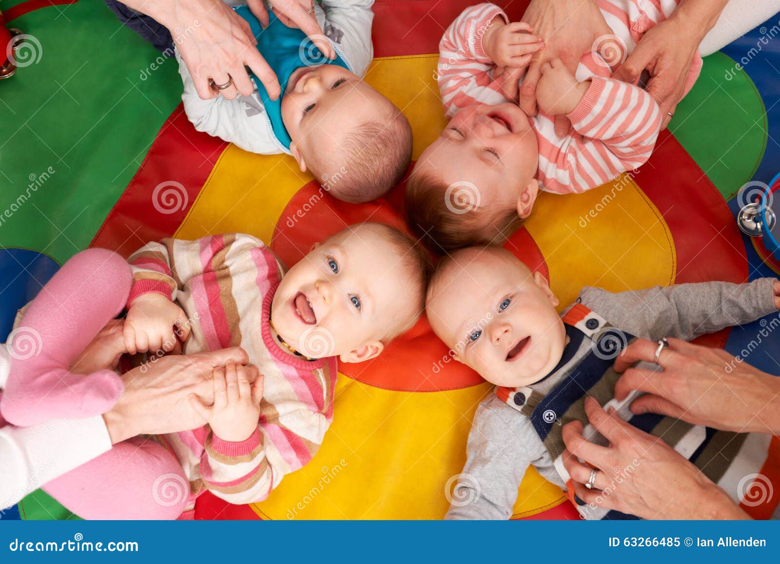 Overhead View Of Babies Having Fun At Nursery Playgroup Stock Photo ...