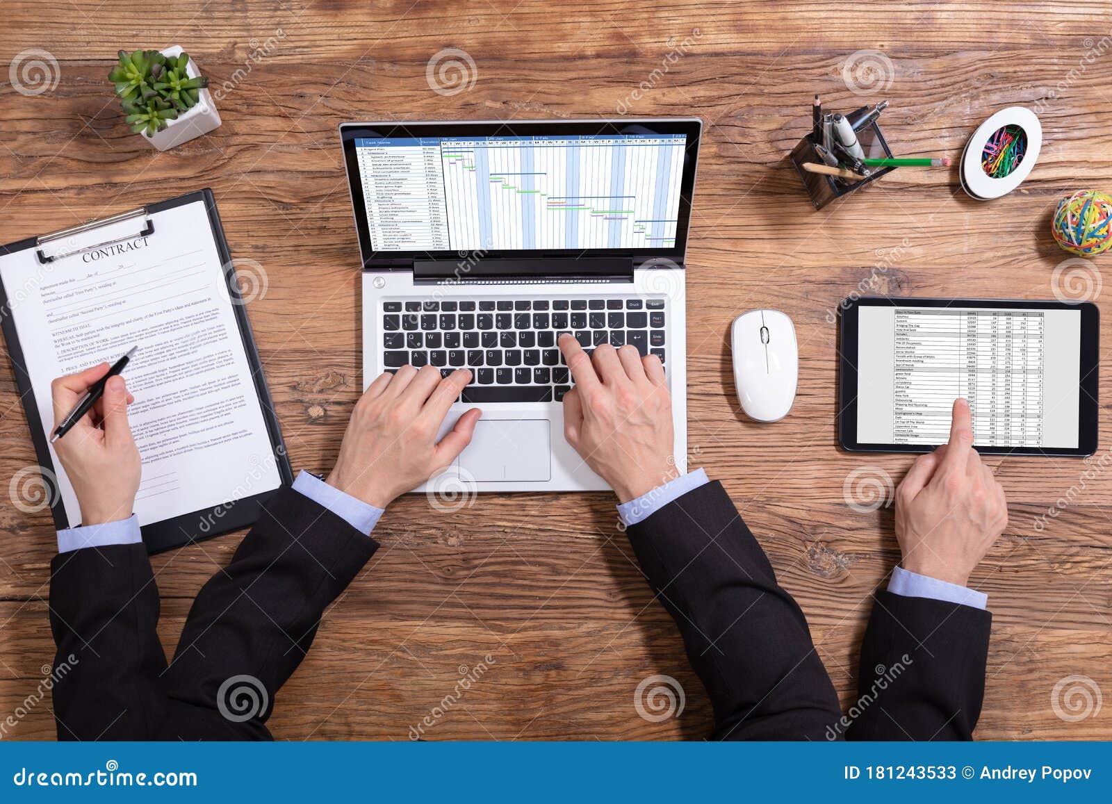 Businessman Doing Multitasking Work in Office Stock Image - Image of ...
