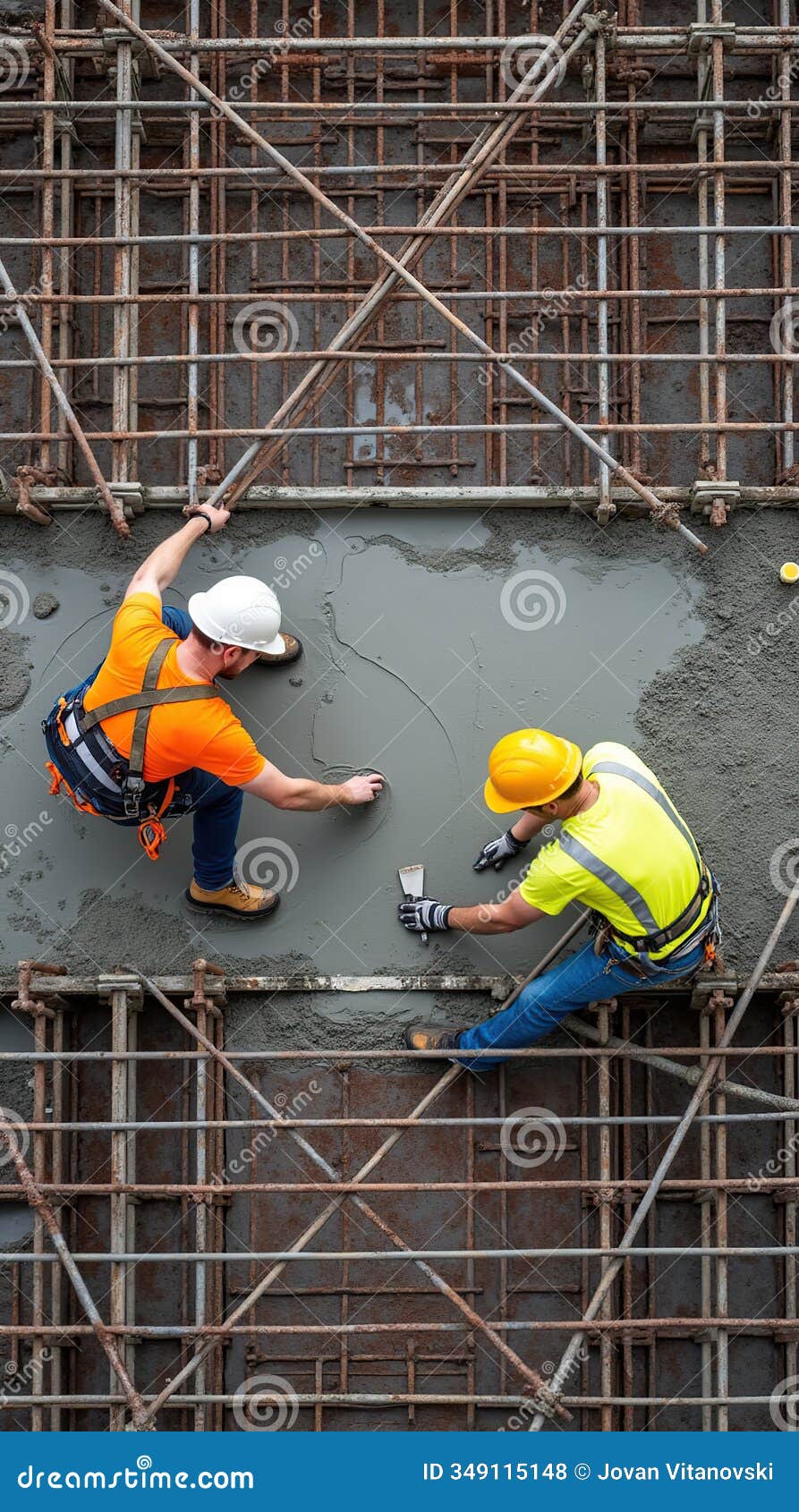 Overhead View of Construction Workers Leveling Freshly Poured Concrete ...