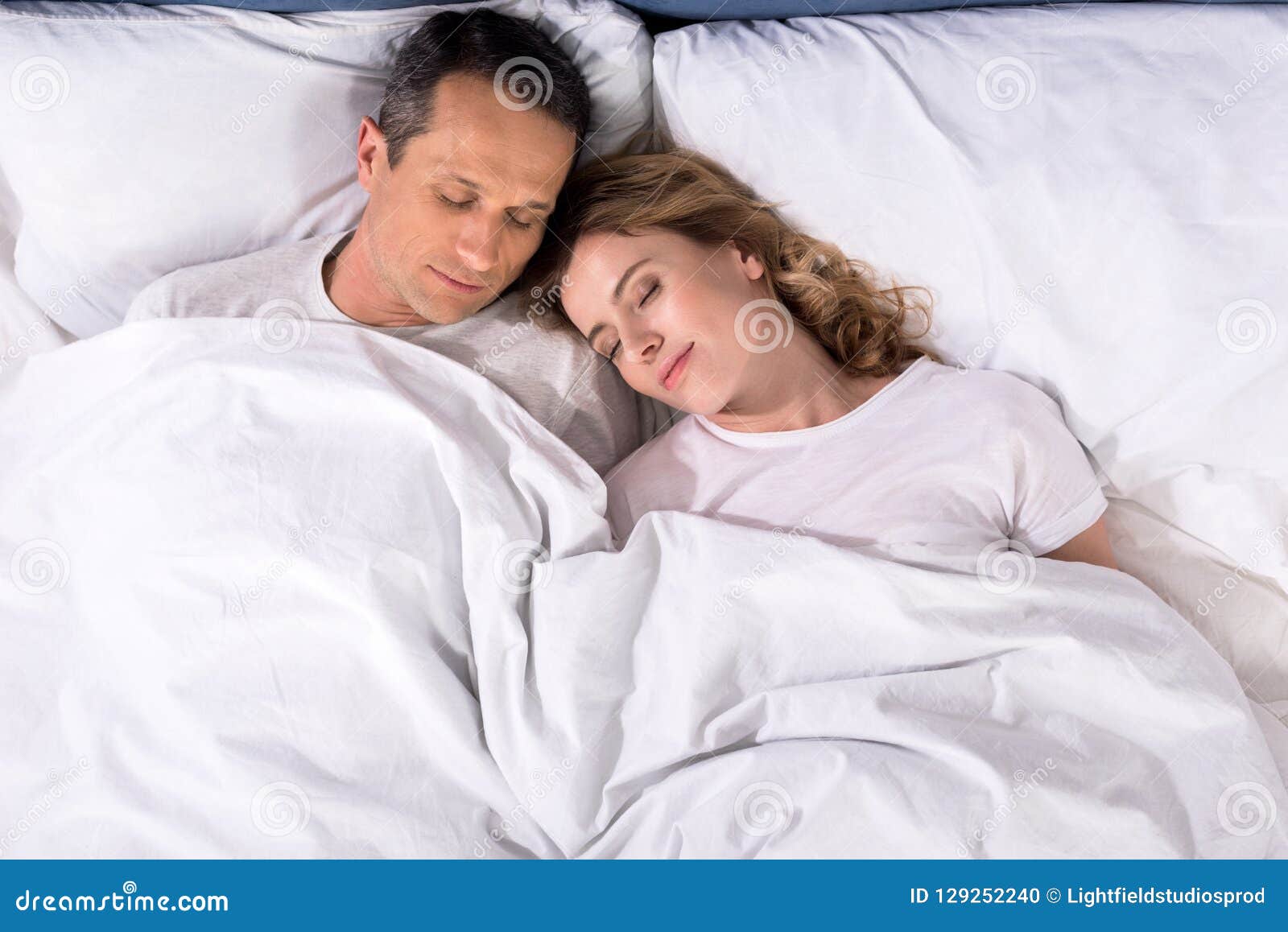 Overhead View of Couple Sleeping in Bed Stock Photo - Image of family ...