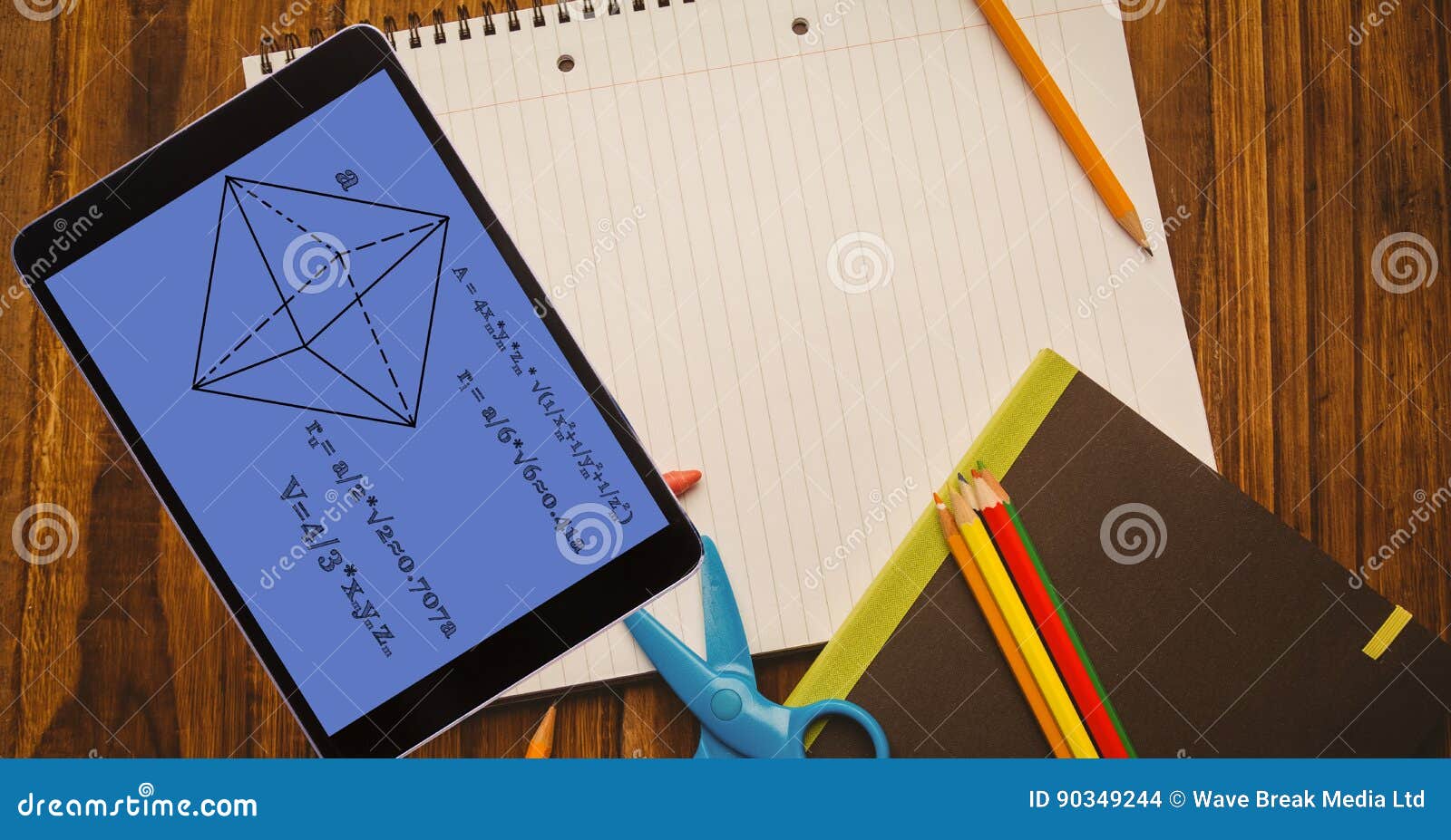 Overhead View of Diagram with Formula in Digital Tablet on Book at ...