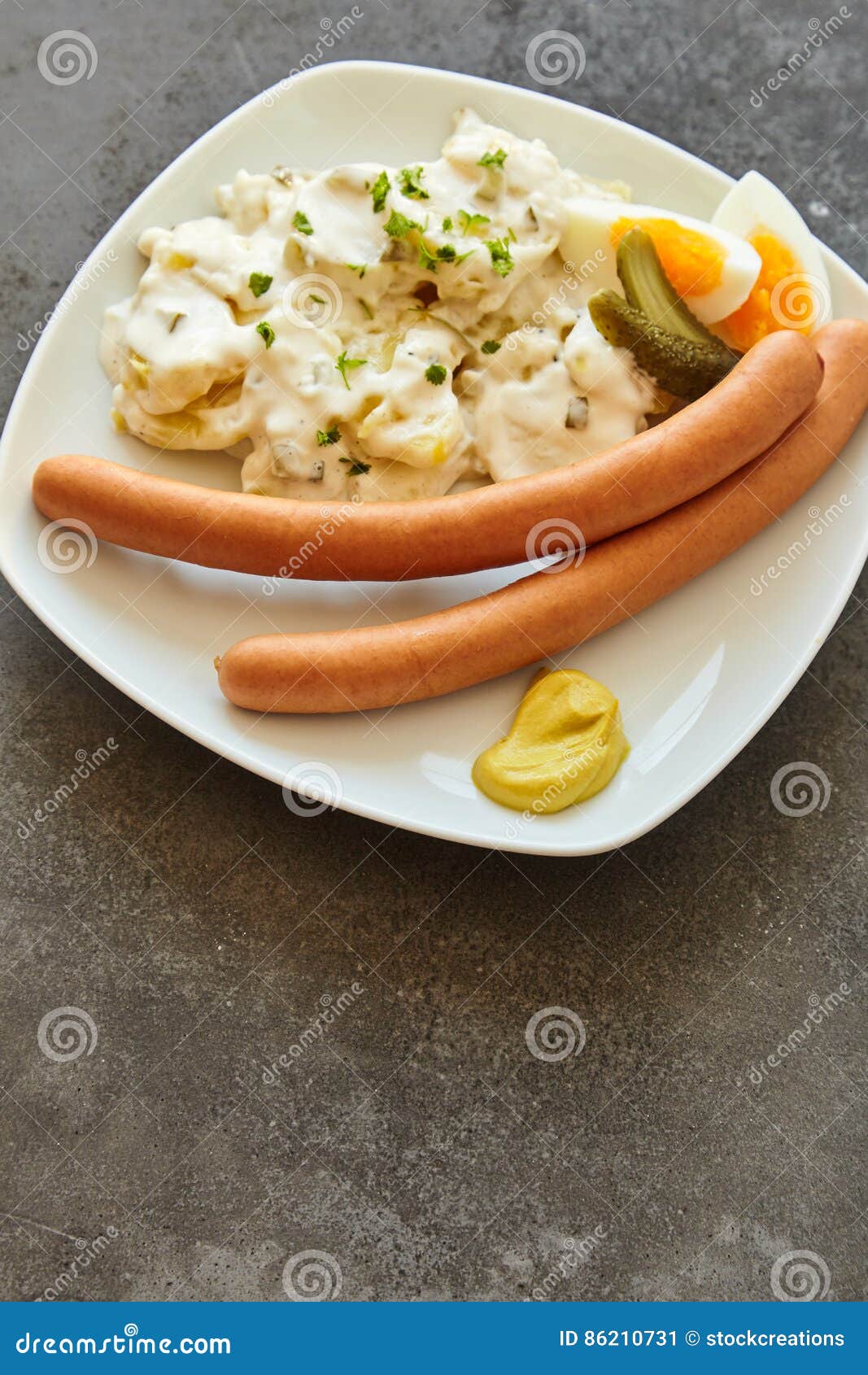 Overhead View of German Kitchen Meal Bockwurst and Potato Salad Stock ...