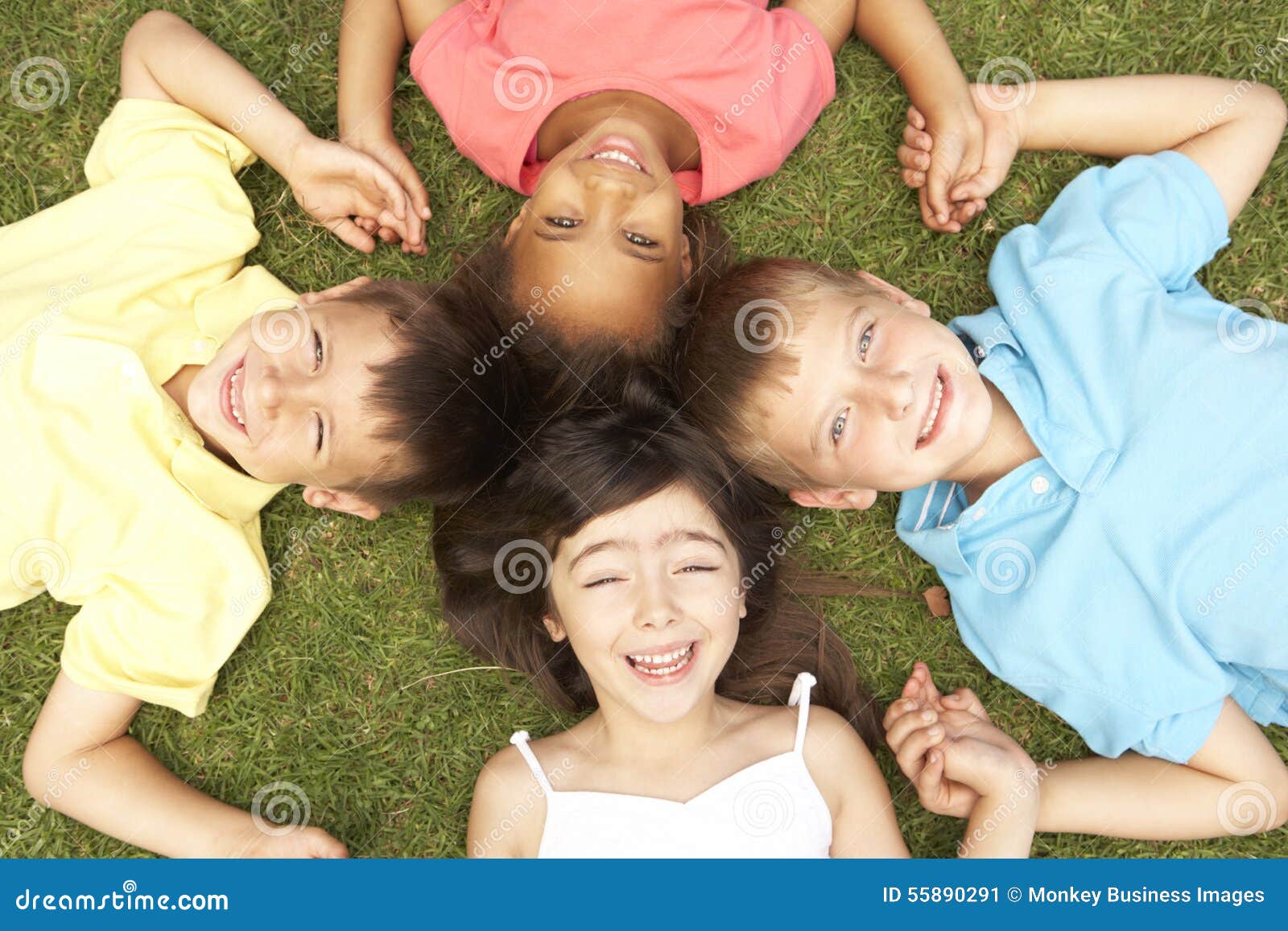Overhead View of Group of Smiling Children Stock Image - Image of lying ...