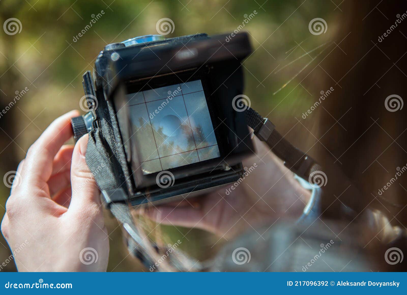 An Overhead View of Hands Holding a Medium Format Retro Film Camera ...