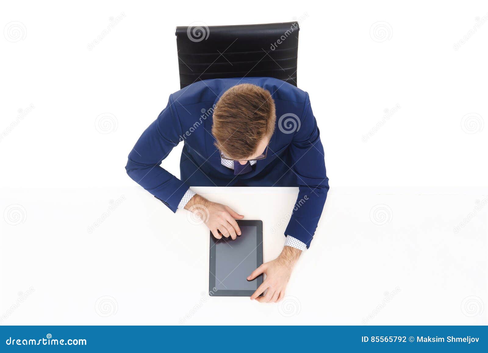 Overhead View of a Handsome Businessman Working with Tablet Computer in ...