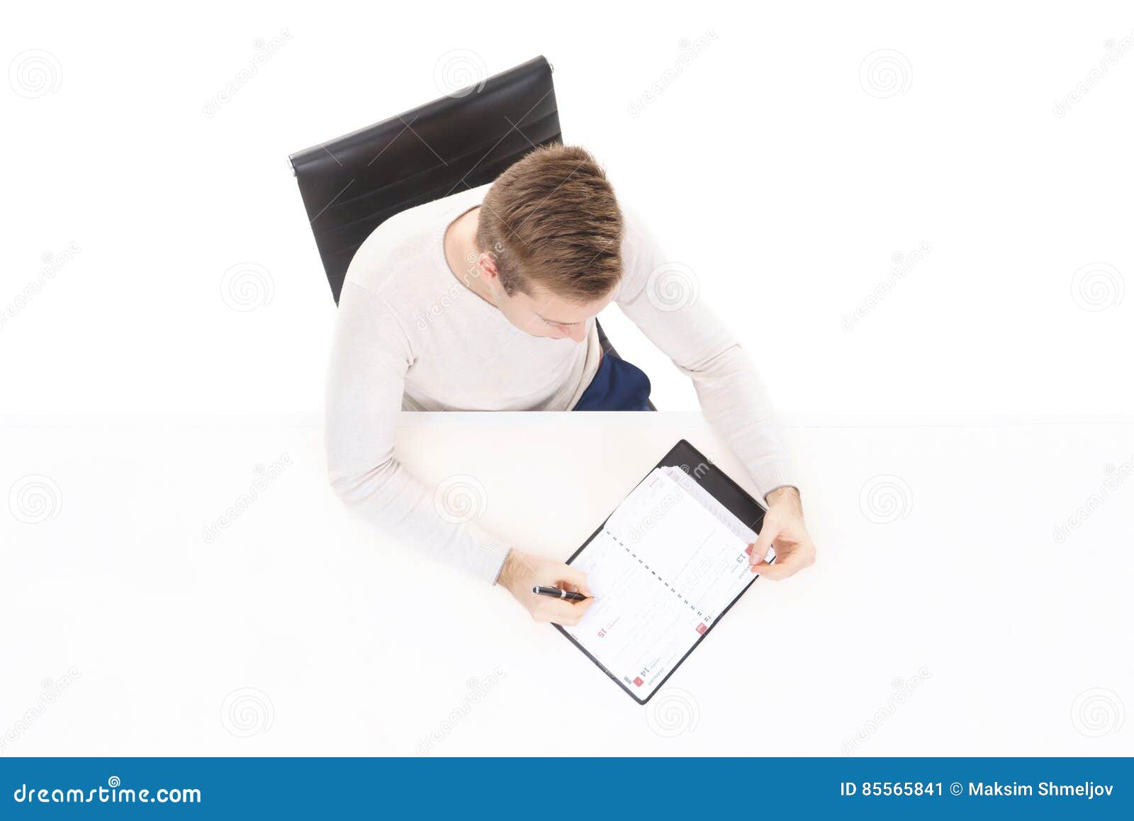 Overhead View of a Handsome Guy with Organizer in Office. Business and ...
