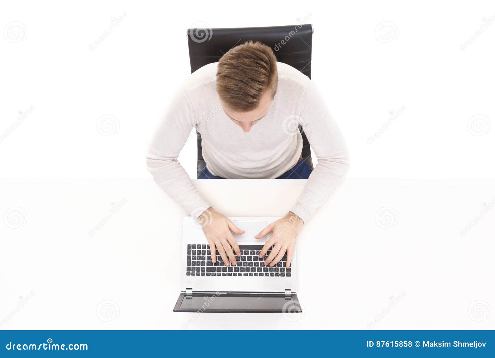 Overhead View of a Handsome Guy Working in Office on a Laptop. B Stock ...
