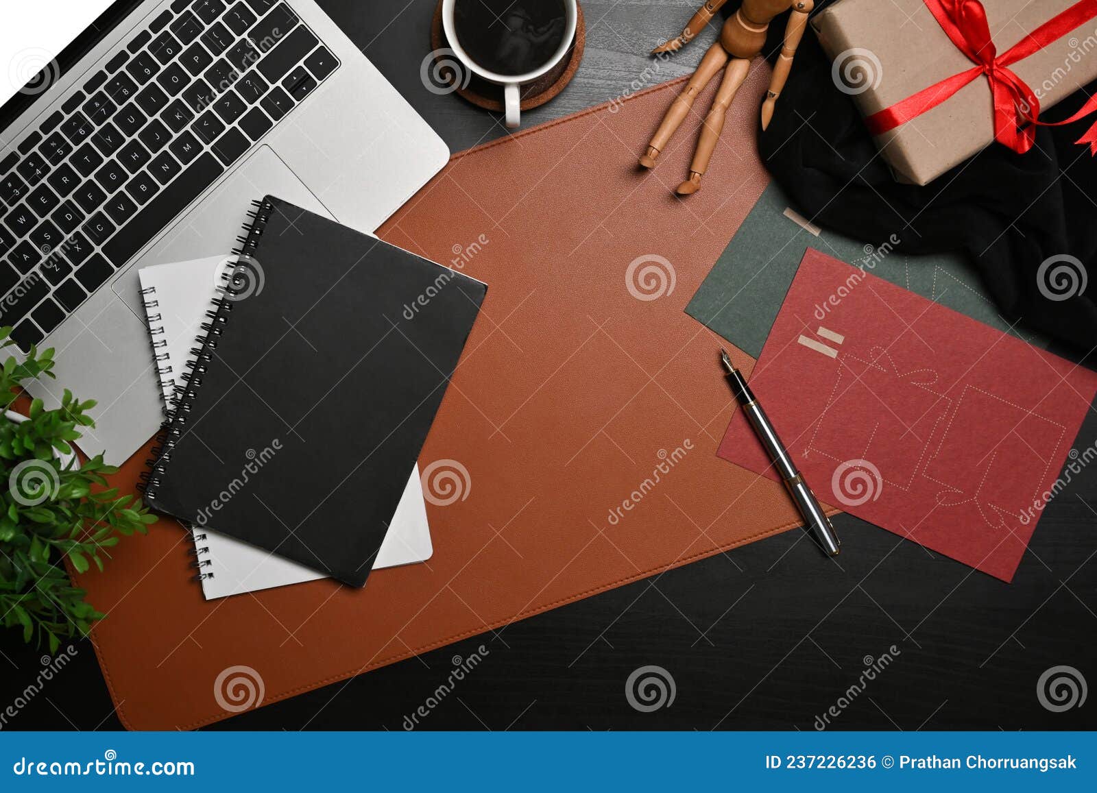 Laptop Computer, Gift Box and Paper Card on Black Table. Stock Photo ...